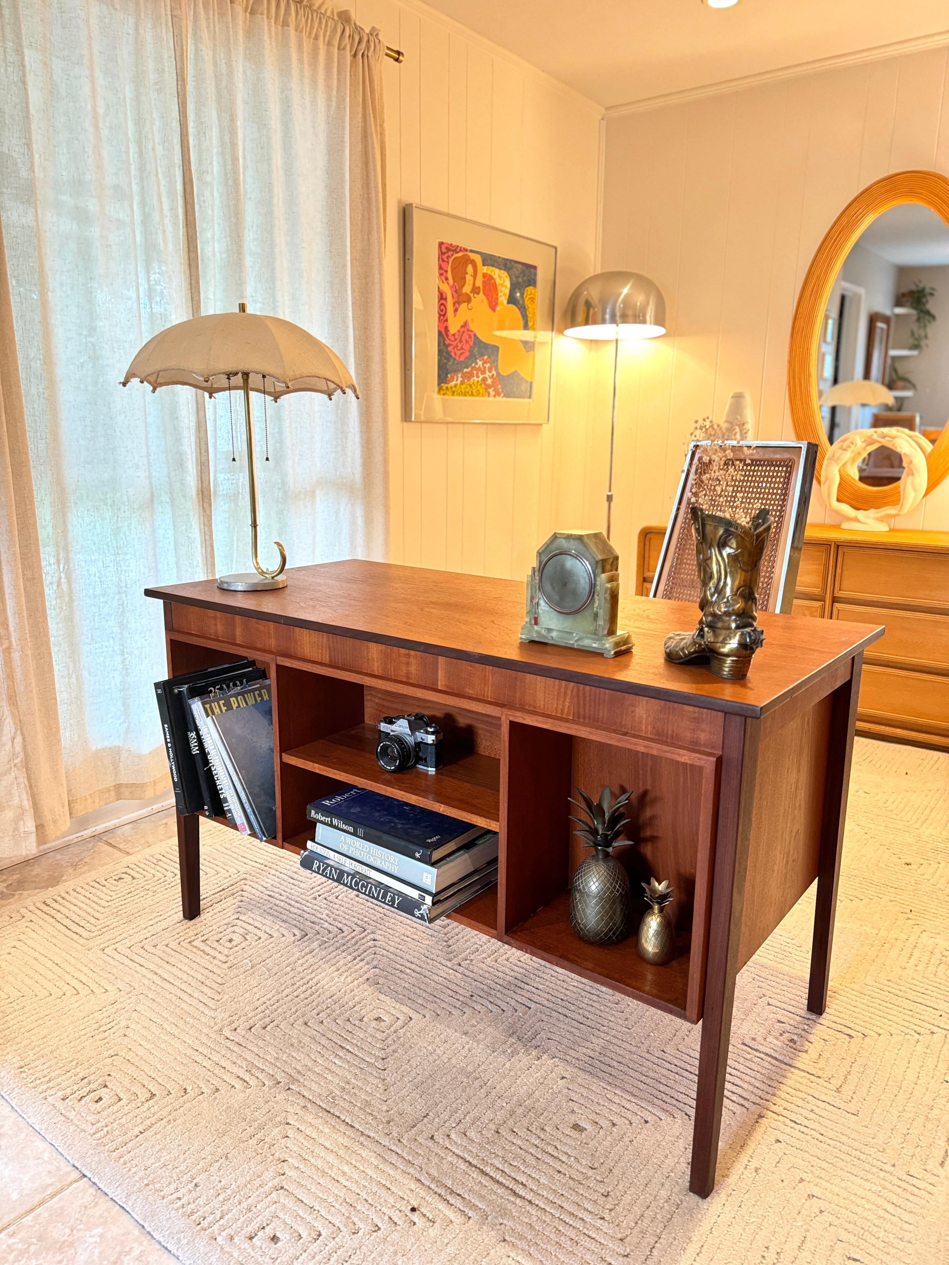 Mid century modern front facing desk made of teak, circa 1960s at 1stDibs