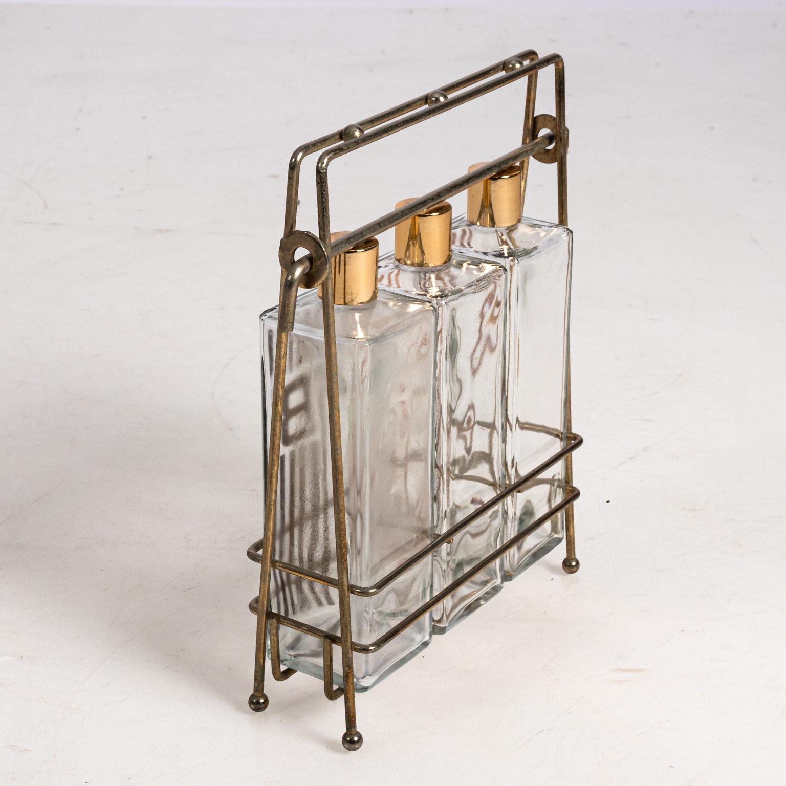 Mid-Century Modern Glass Decanter Set with Brass Stand at 1stDibs