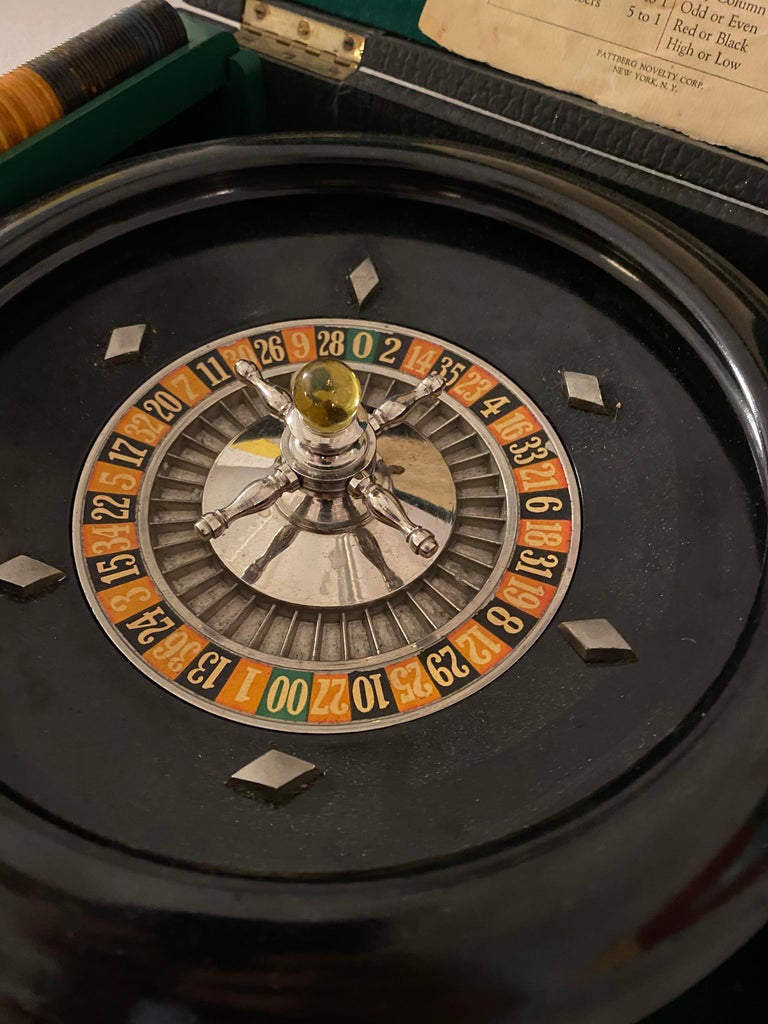 Mid-Century Modern Roulette Set with Bakelite Handle and Chips in ...