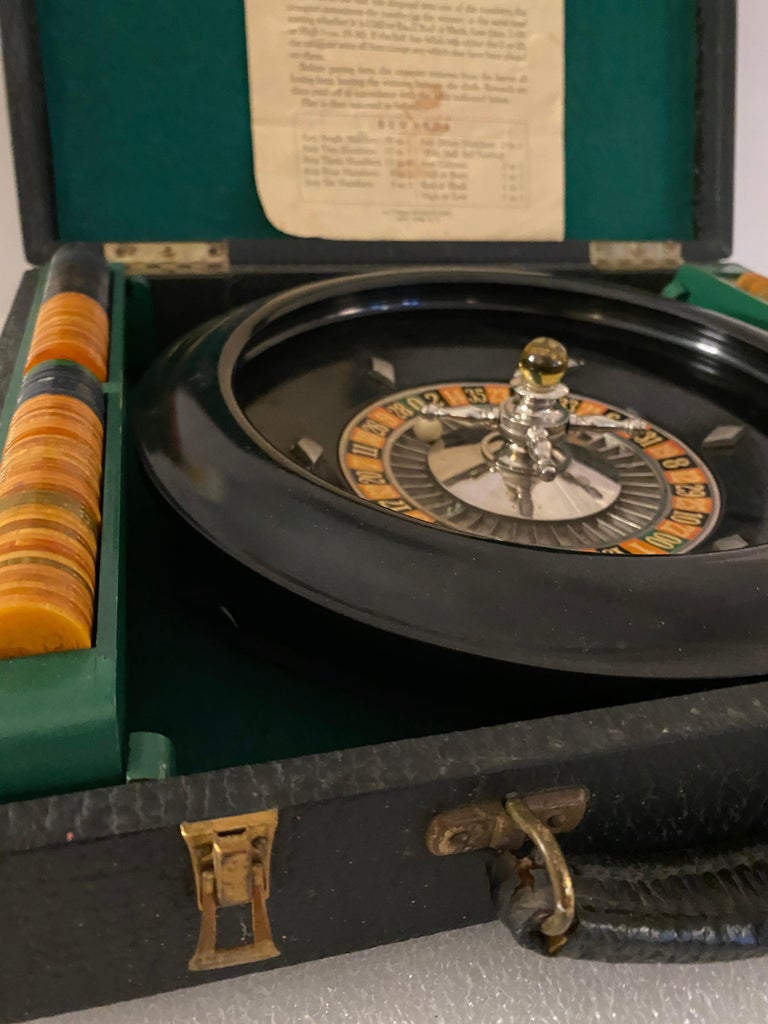 Mid-Century Modern Roulette Set with Bakelite Handle and Chips in ...
