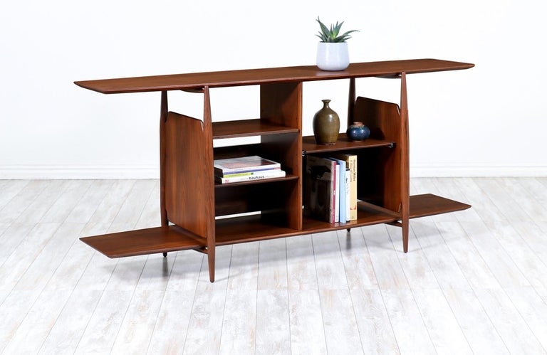 Mid-Century Modern Sculpted Walnut Tier Bookshelf For Sale at 1stDibs
