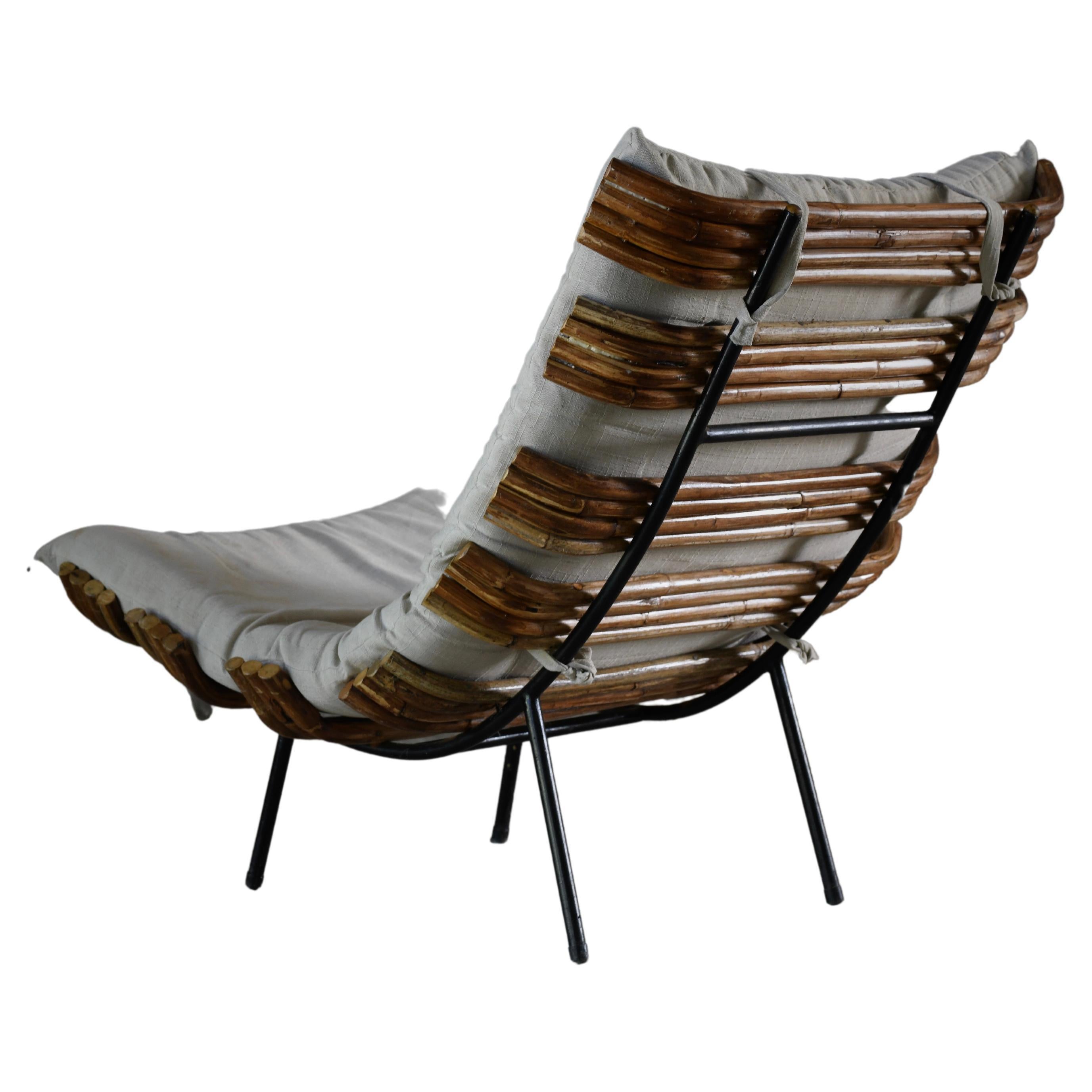 Muttendam Mid-Century Rattan and Leather Armed Lounge Chair at 1stDibs