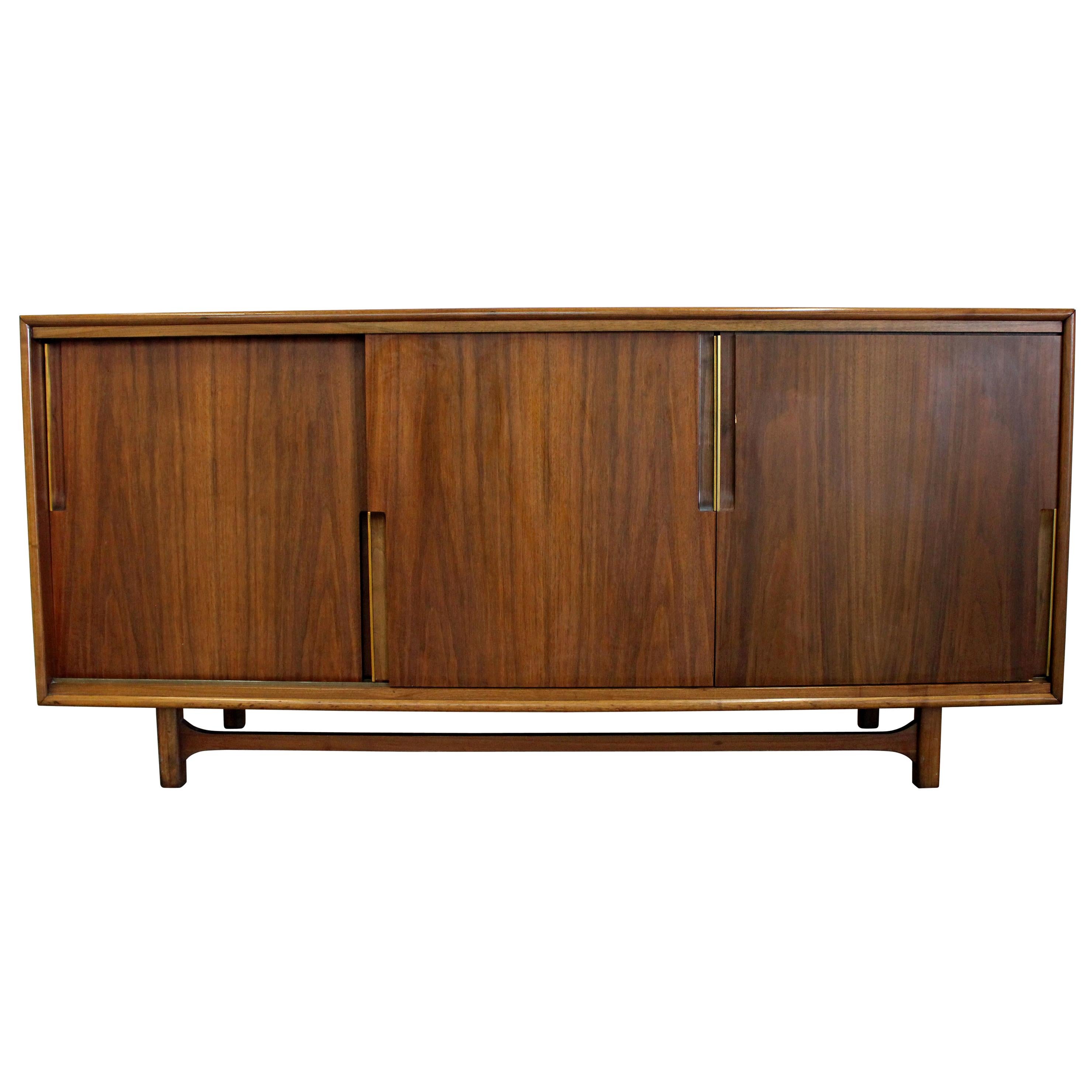 Mid-Century Modern Walnut Bi-Folding Door Credenza at 1stDibs