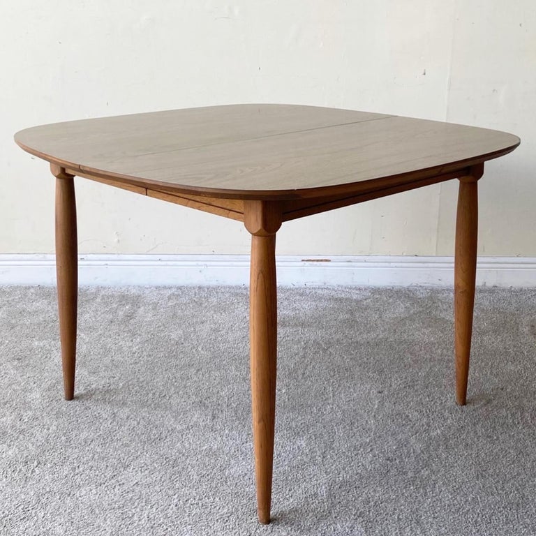 Mid-Century Modern Wooden Extendable Dining Table at 1stDibs