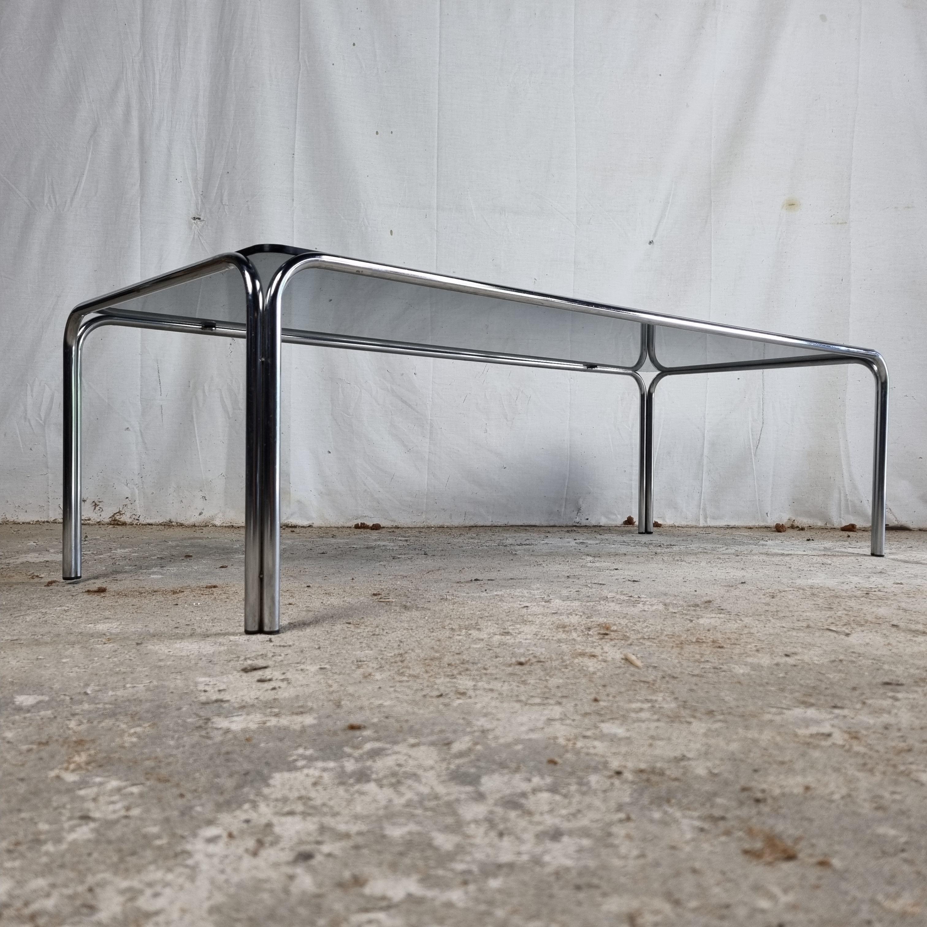 Mid Century smoked glass, chrome tubular coffee table 1970s at 1stDibs