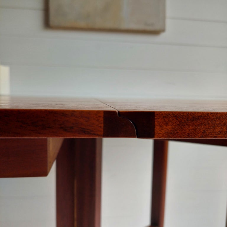 Mid Century teak and afromosia gateleg Danish dining table, George ...