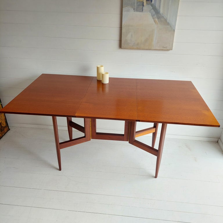 Mid Century teak and afromosia gateleg Danish dining table, George ...