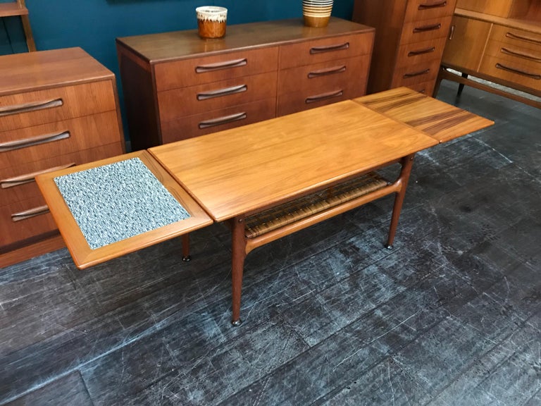 Midcentury Teak Metamorphic Coffee Table with Rattan Magazine Shelf by ...