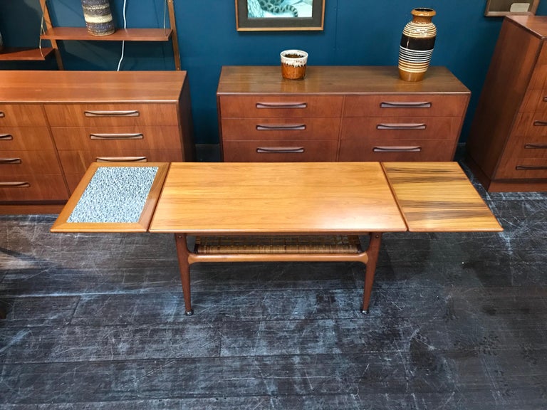 Midcentury Teak Metamorphic Coffee Table with Rattan Magazine Shelf by ...