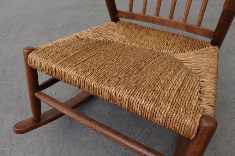 Midcentury Teak Spindle Back Rocking Chair with Rush Seat at 1stDibs