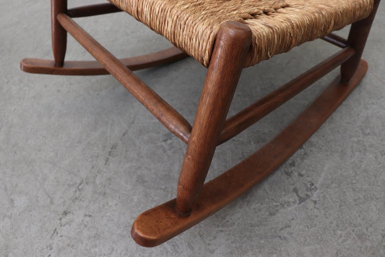 Midcentury Teak Spindle Back Rocking Chair with Rush Seat at 1stDibs