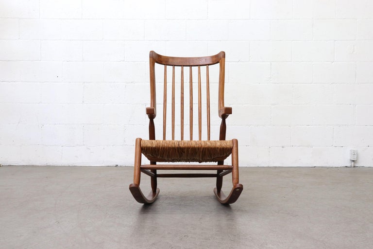 Midcentury Teak Spindle Back Rocking Chair with Rush Seat at 1stDibs