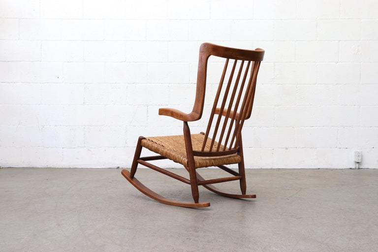 Midcentury Teak Spindle Back Rocking Chair with Rush Seat at 1stDibs