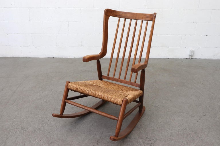 Midcentury Teak Spindle Back Rocking Chair with Rush Seat at 1stDibs