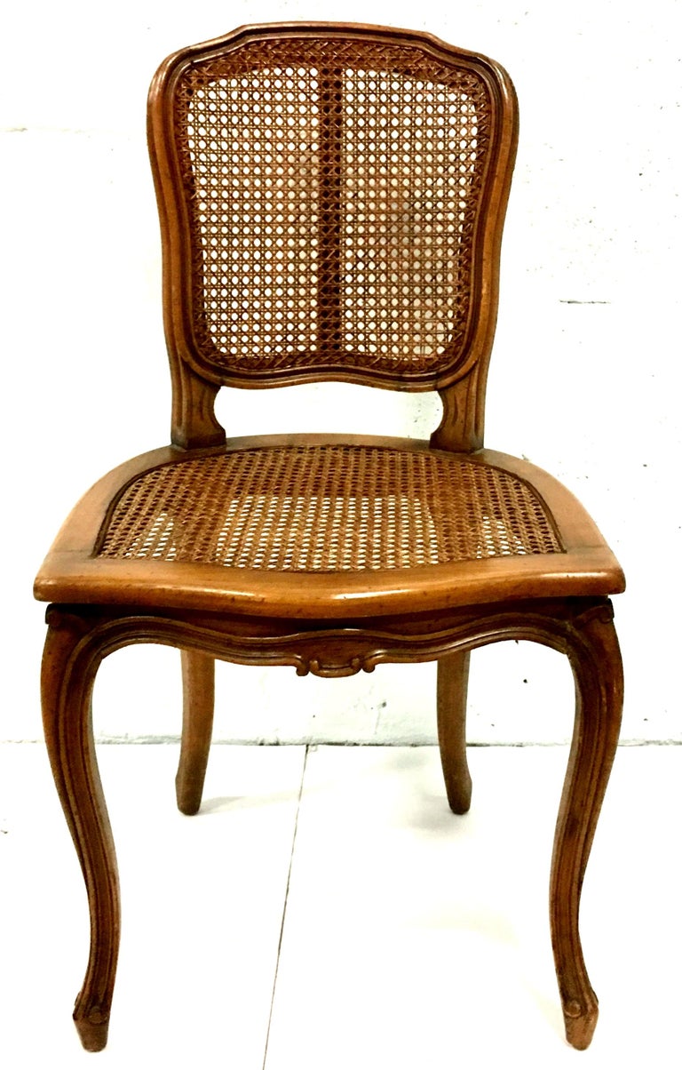 Mid-Century Pair Of French Style Carved Wood and Cane Chairs For Sale ...