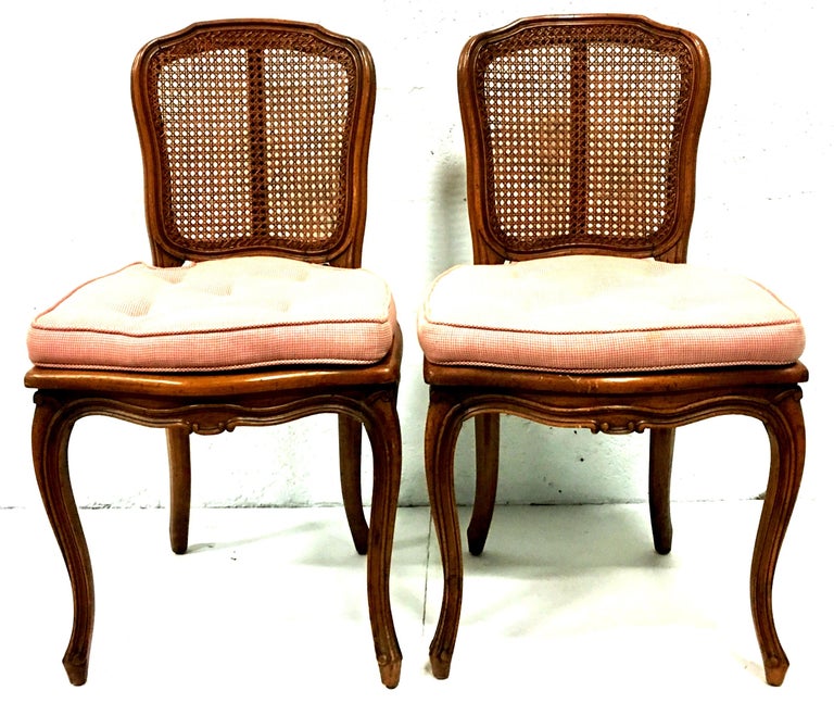 Mid-Century Pair Of French Style Carved Wood and Cane Chairs For Sale ...
