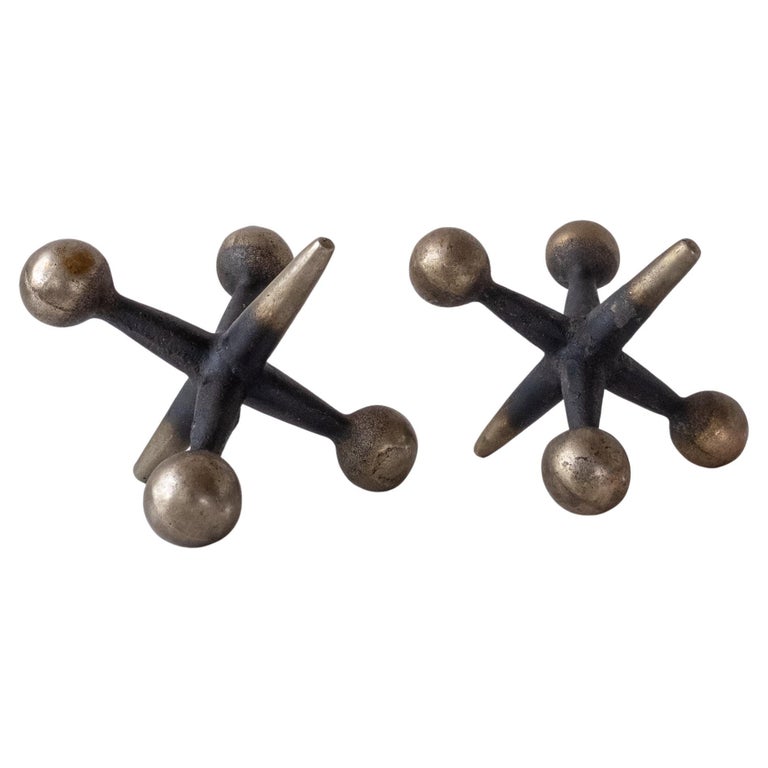 Midcentury Sculptural Brass Jacks Bookends For Sale at 1stDibs