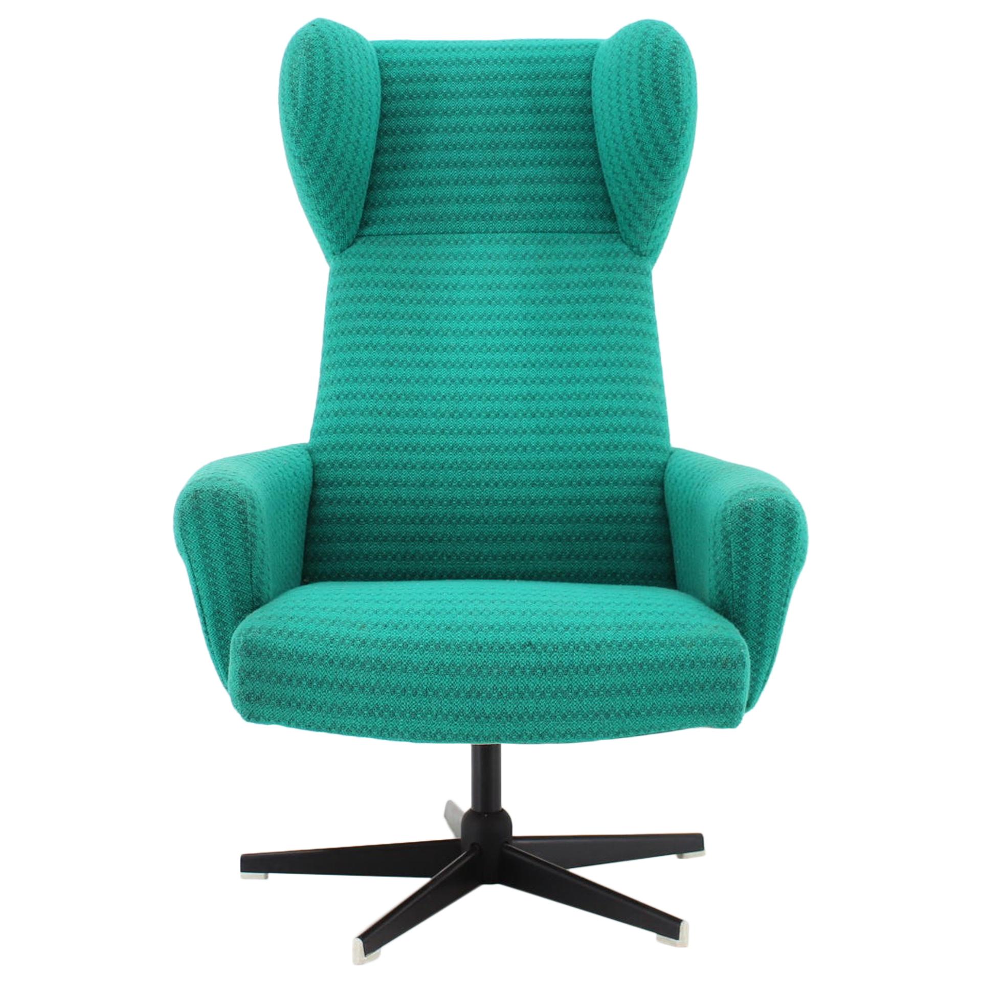 Midcentury Swivel Wing Chair at 1stDibs