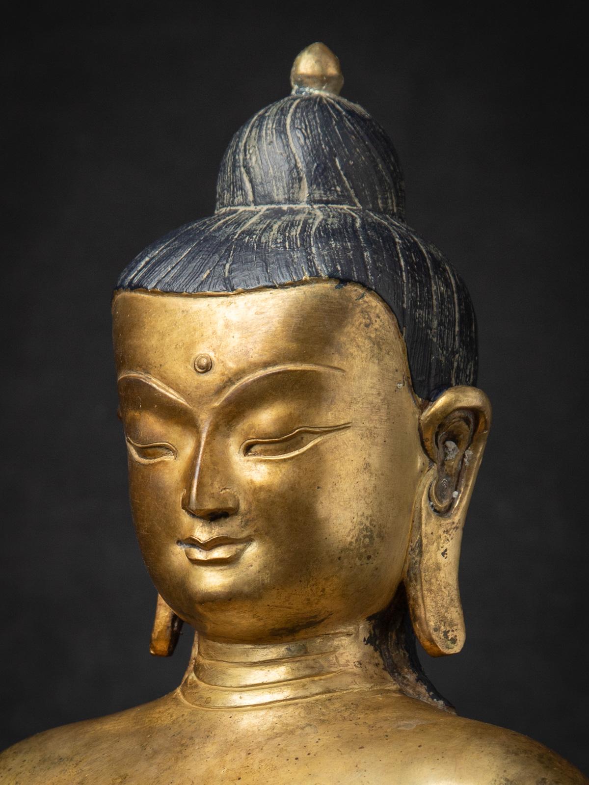 Middle 20th century Old bronze Nepali Buddha statue in Dharmachakra ...