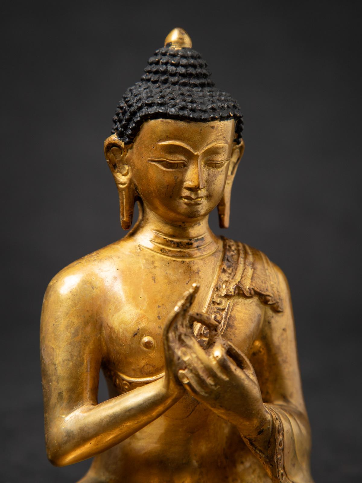 Middle 20th century Old bronze Nepali Buddha statue in Dharmachakra ...