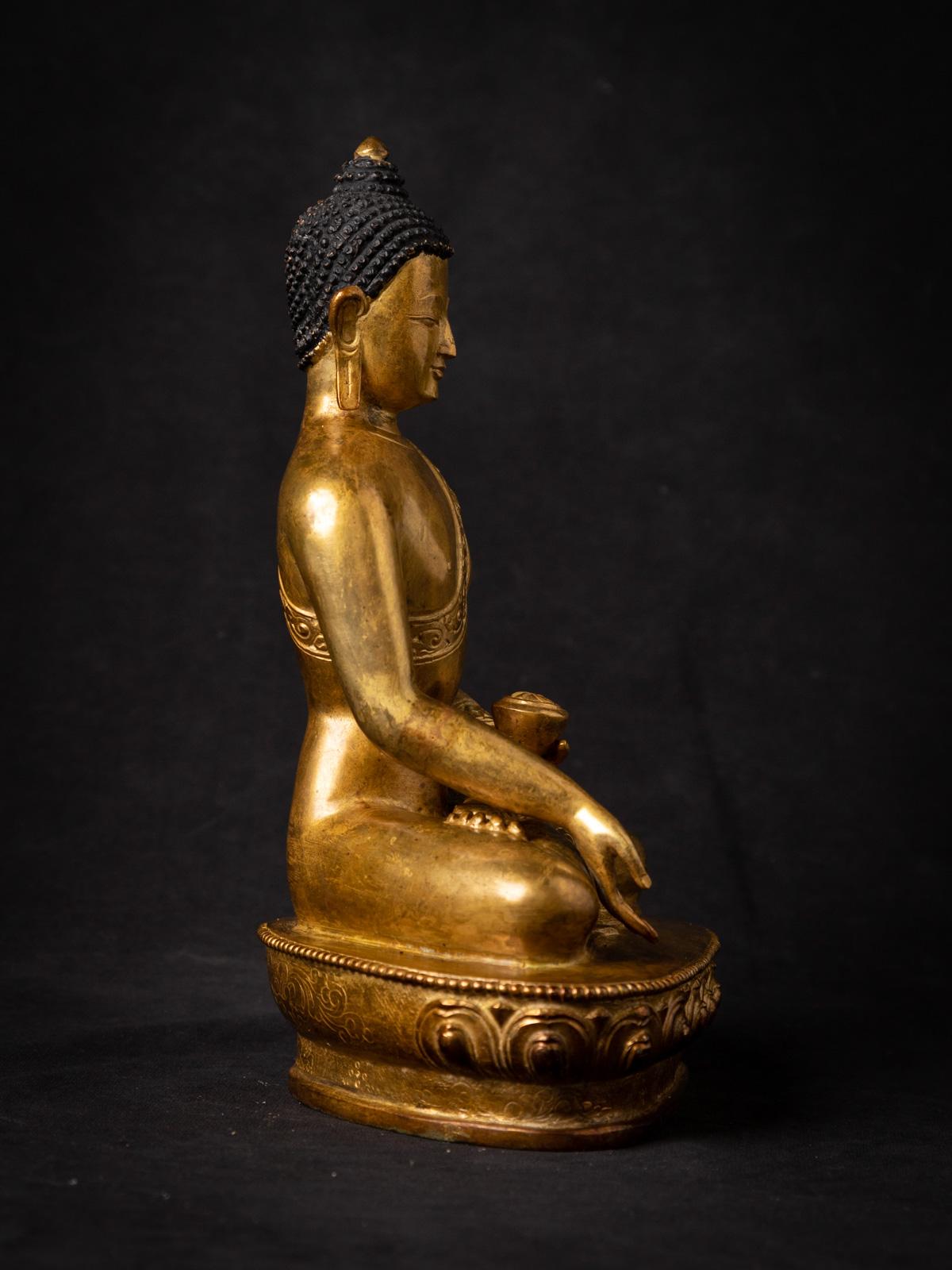 Middle 20th century Old bronze Nepali Buddha statue in Varada Mudra For ...