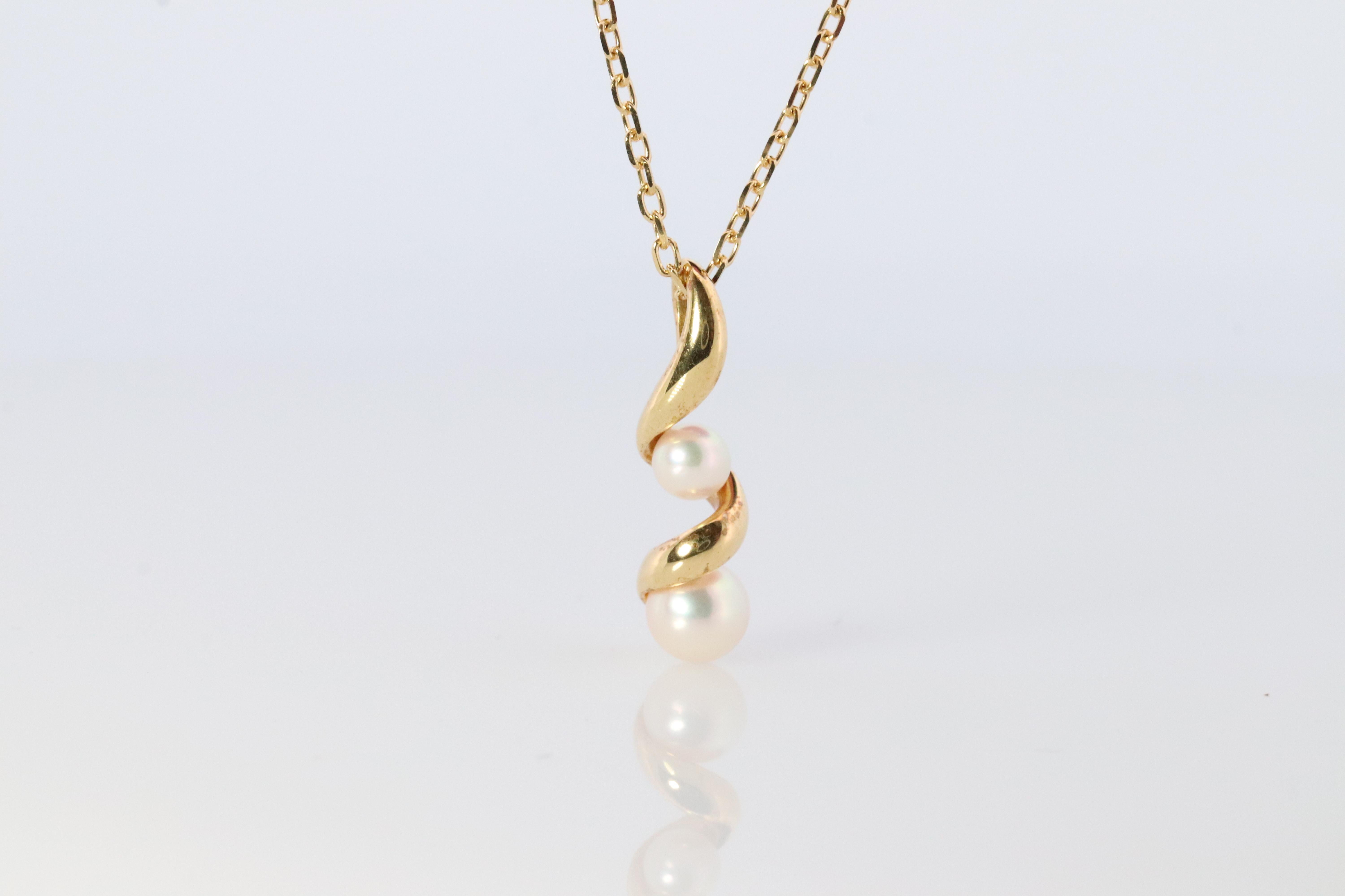 Mikimoto Pendant. 18k Gold Mikimoto Swirl Pearl Necklace. at 1stDibs