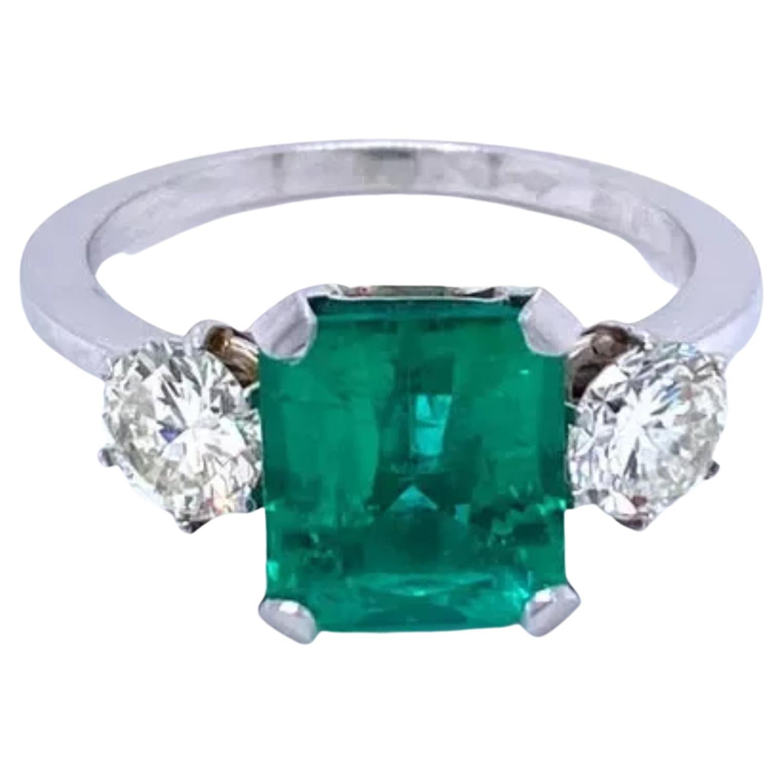 Three-Stone Emerald and Diamond Ring at 1stDibs