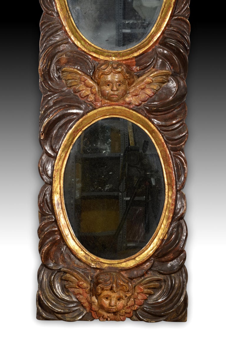 Mirror with angel heads. Carved and polychrome pine wood. Spanish ...