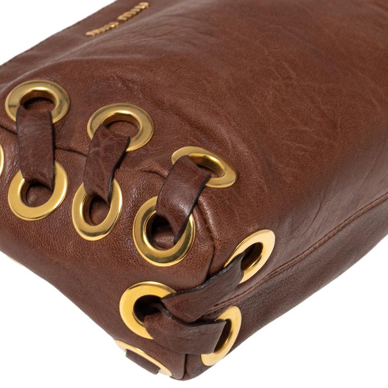 Miu Miu Brown Leather Eyelet Pochette Clutch For Sale at 1stDibs