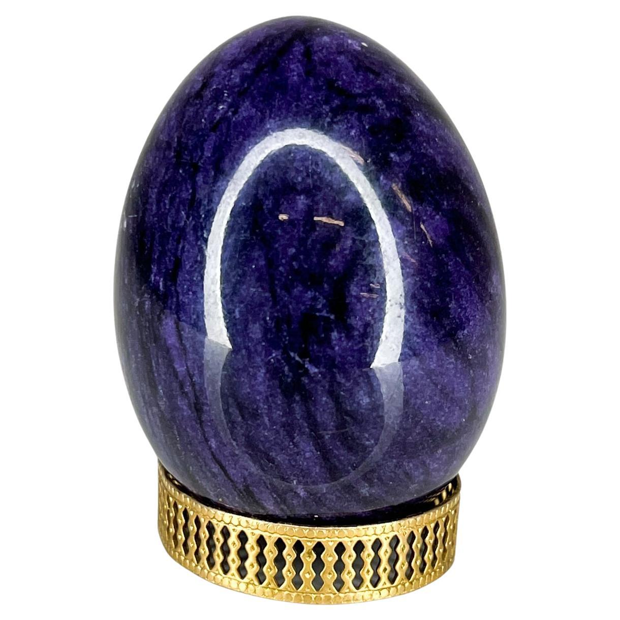Modern Carved Stone Egg Sculpture Atop Black and Transparent Resin Base ...