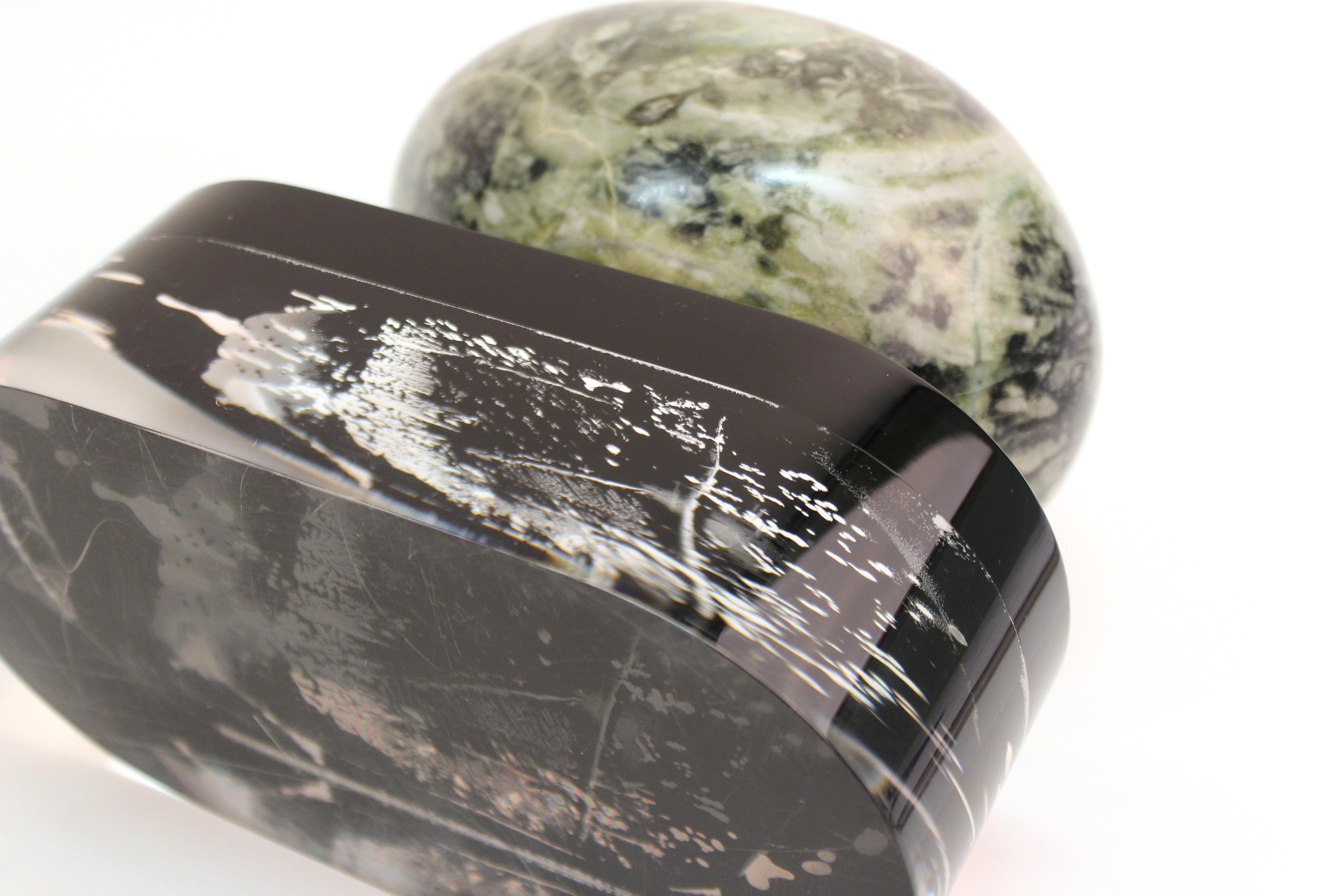Modern Carved Stone Egg Sculpture Atop Black and Transparent Resin Base ...