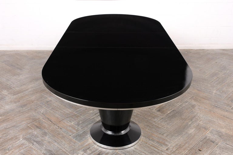 Modern Extendable Oval Dining Table at 1stDibs