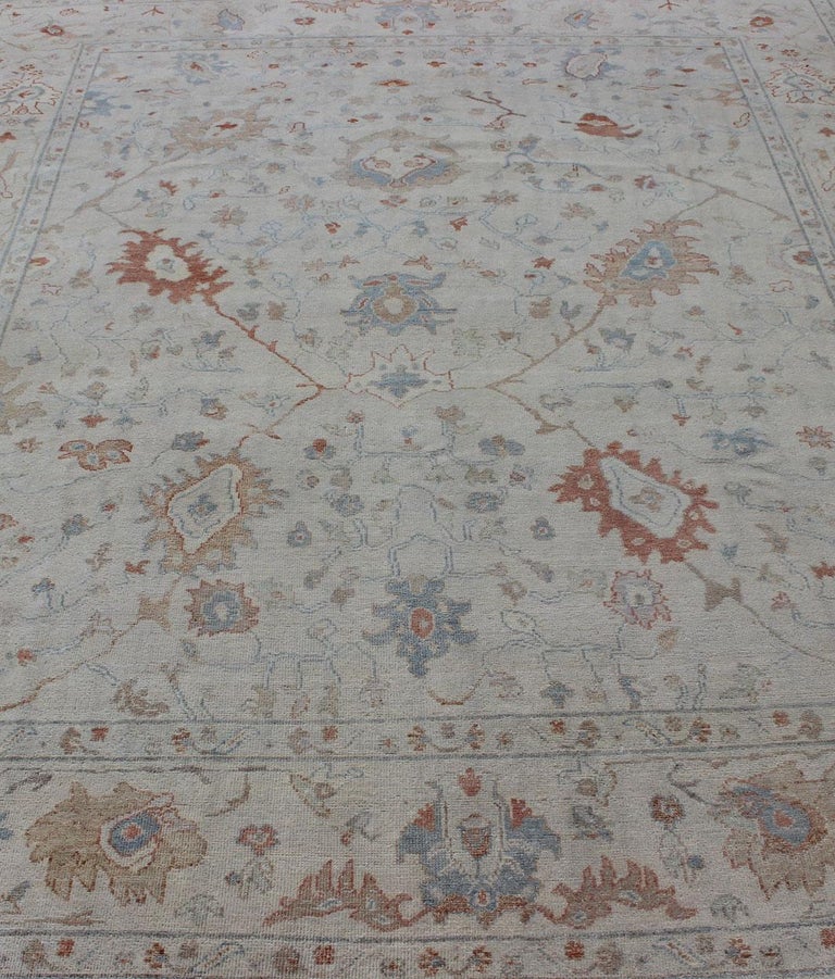 Modern Oushak Muted Rug in Coral and Light Blue For Sale at 1stDibs