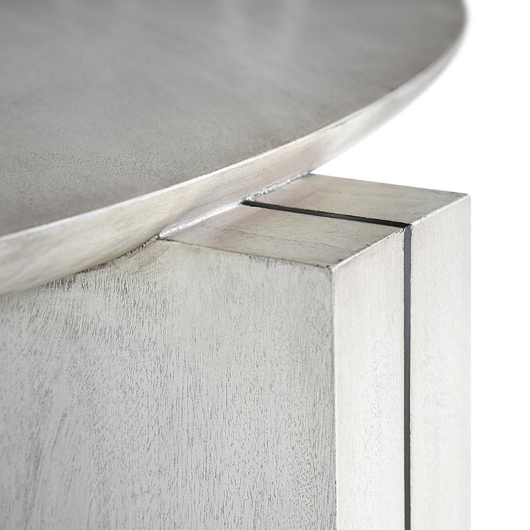 Modern wood Chianni cocktail table, circular top and rectangular legs ...