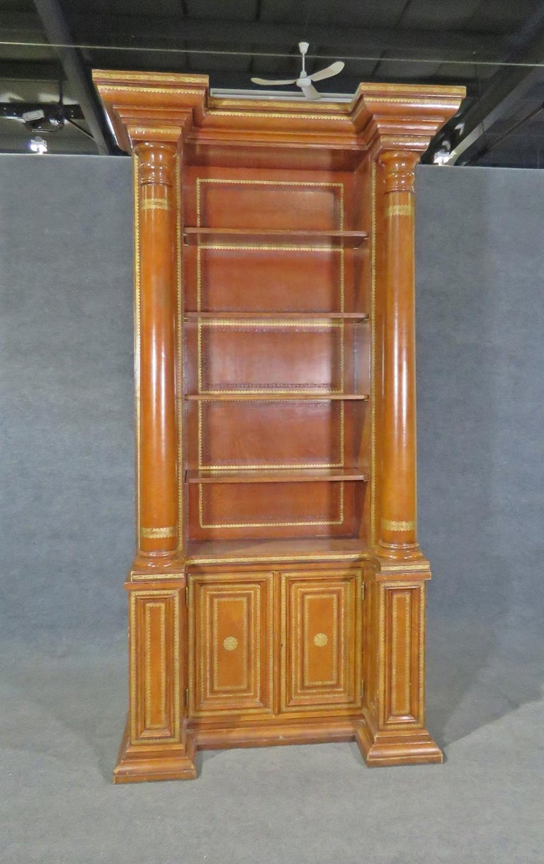 Monumental Maitland Smith Gold Tooled Leather Wrapped Bookcase at 1stDibs
