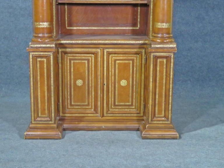 Monumental Maitland Smith Gold Tooled Leather Wrapped Bookcase at 1stDibs