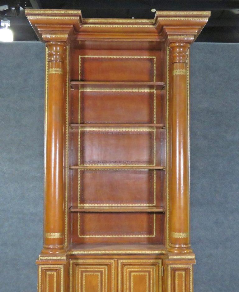 Monumental Maitland Smith Gold Tooled Leather Wrapped Bookcase at 1stDibs