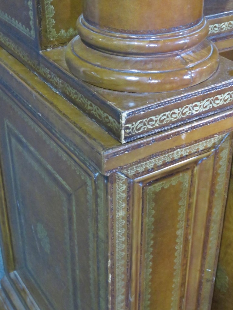 Monumental Maitland Smith Gold Tooled Leather Wrapped Bookcase at 1stDibs