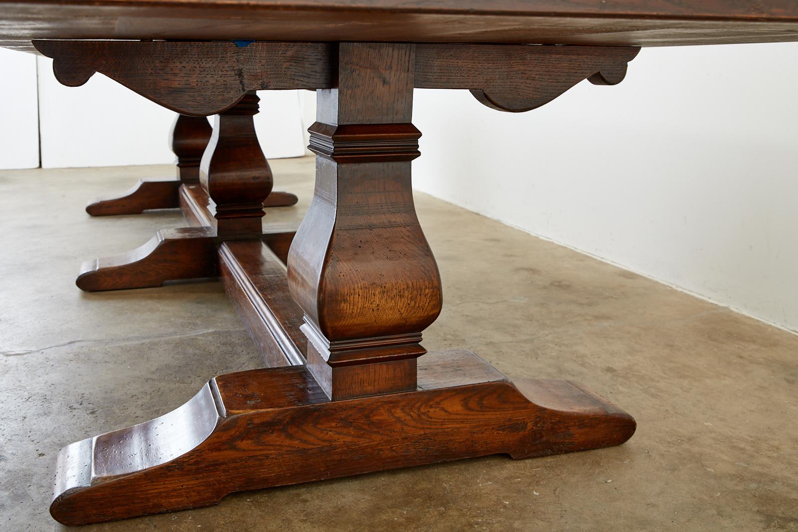 Monumental Triple Pedestal Oak Trestle Dining Table at 1stDibs