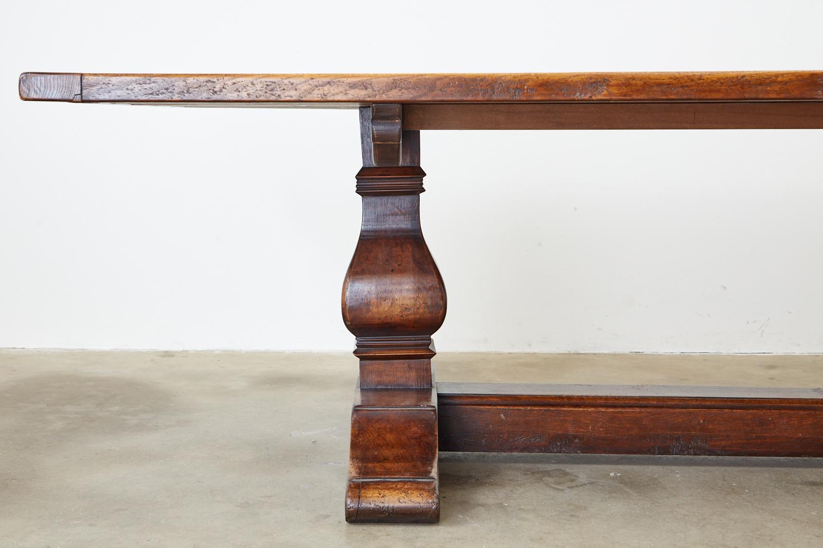 Monumental Triple Pedestal Oak Trestle Dining Table at 1stDibs