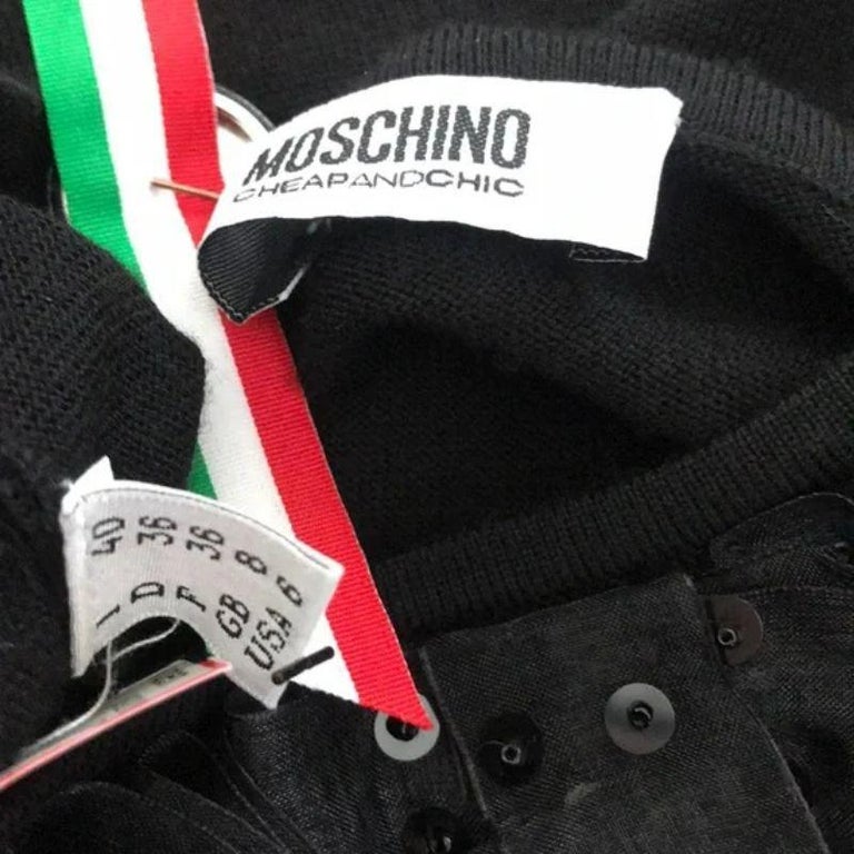 Moschino Black Wool Ribbon Peace Sign Sweater For Sale at 1stDibs