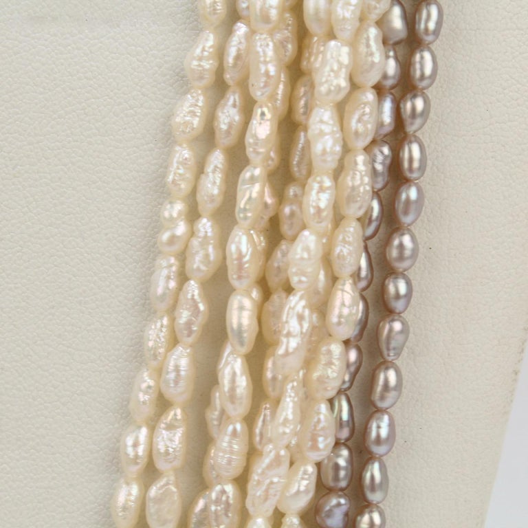 Multi Strand Fresh Water Pearl Necklace With A Brutalist 14 Karat Gold