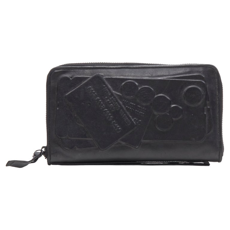 NATALIA BRILLI surrealist card coins shadow deboss black zip clutch bag ...