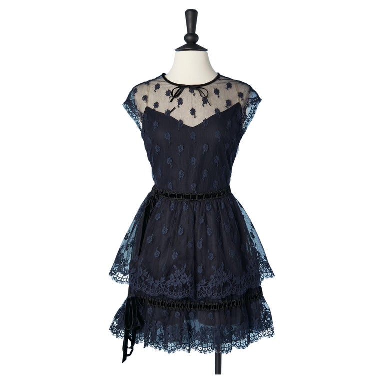 Navy blue cocktail dress in lace with black ribbons and ruffles ...