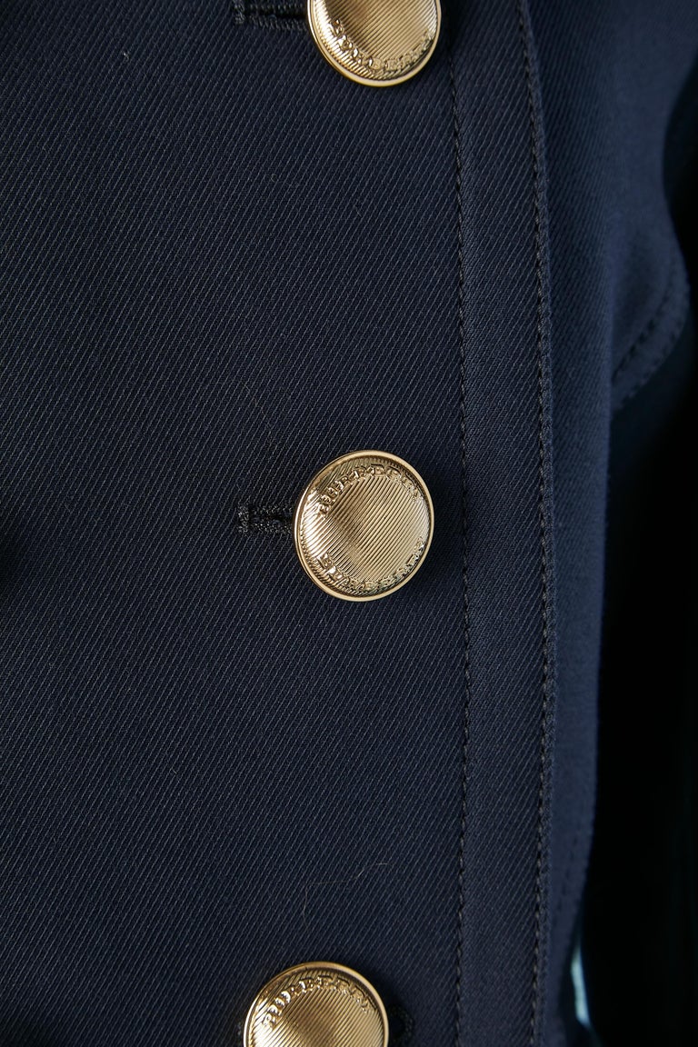 Navy blue wool officer double-breasted jacket and gold metal button ...