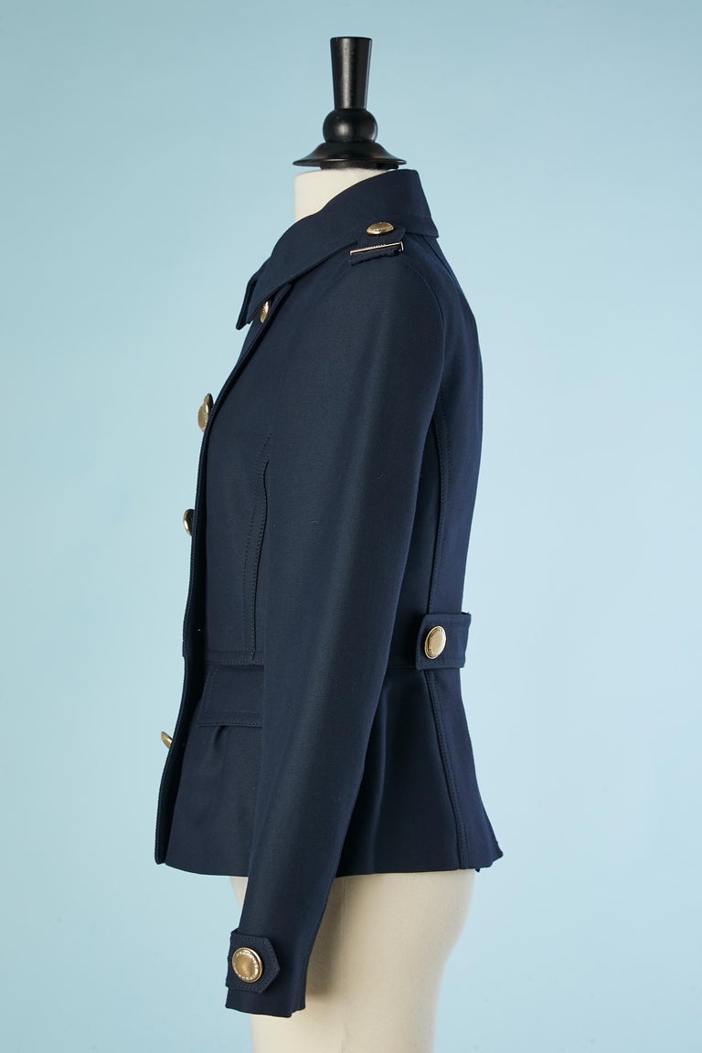 Navy blue wool officer double-breasted jacket and gold metal button ...