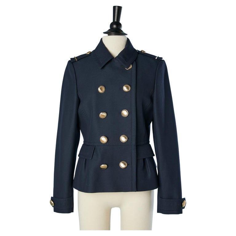 Navy blue wool officer double-breasted jacket and gold metal button ...