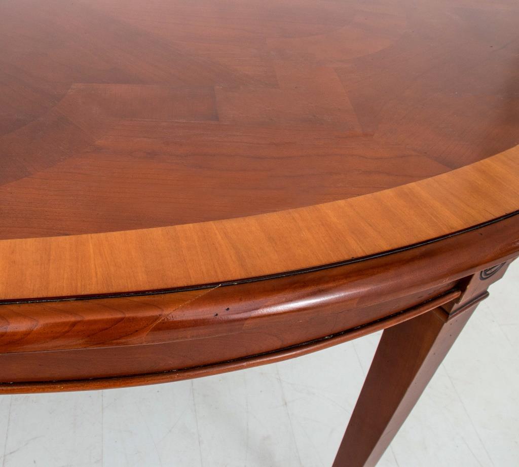 Neoclassical Manner Oval Veneered Dining Table at 1stDibs