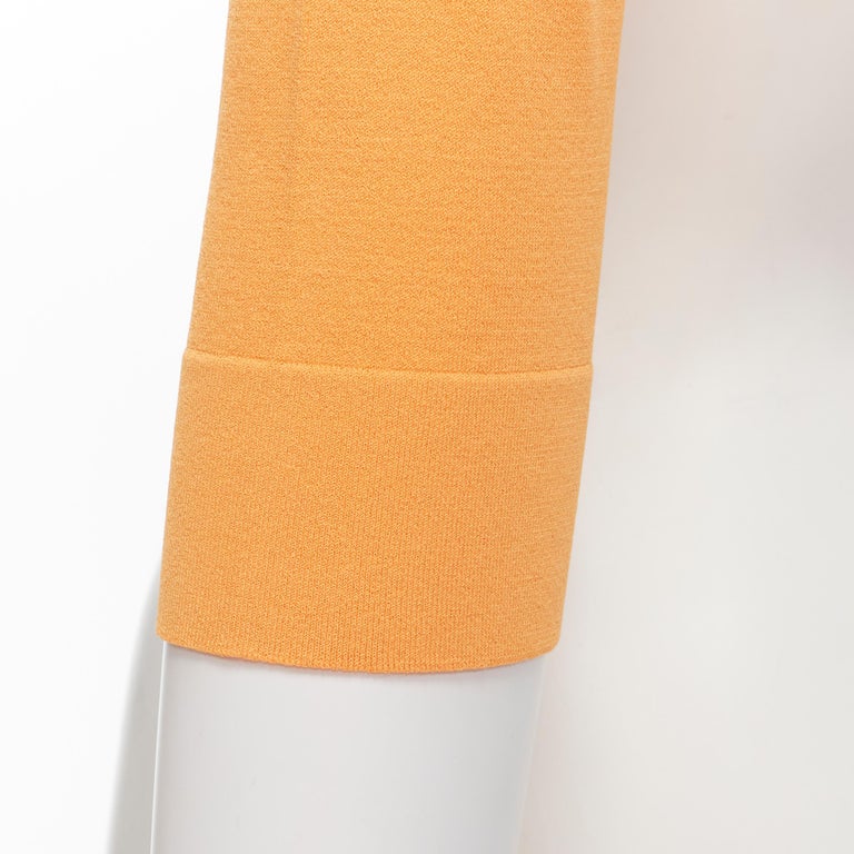 new ALAIA Signature cropped stretch knit button cardigan Ocre orange ...