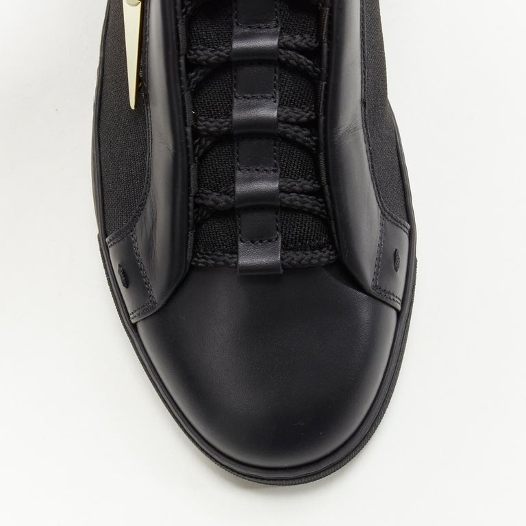 new FENDI Monster Bug Eye gold metal plate black low top sneaker UK7 EU41 For Sale at 1stDibs